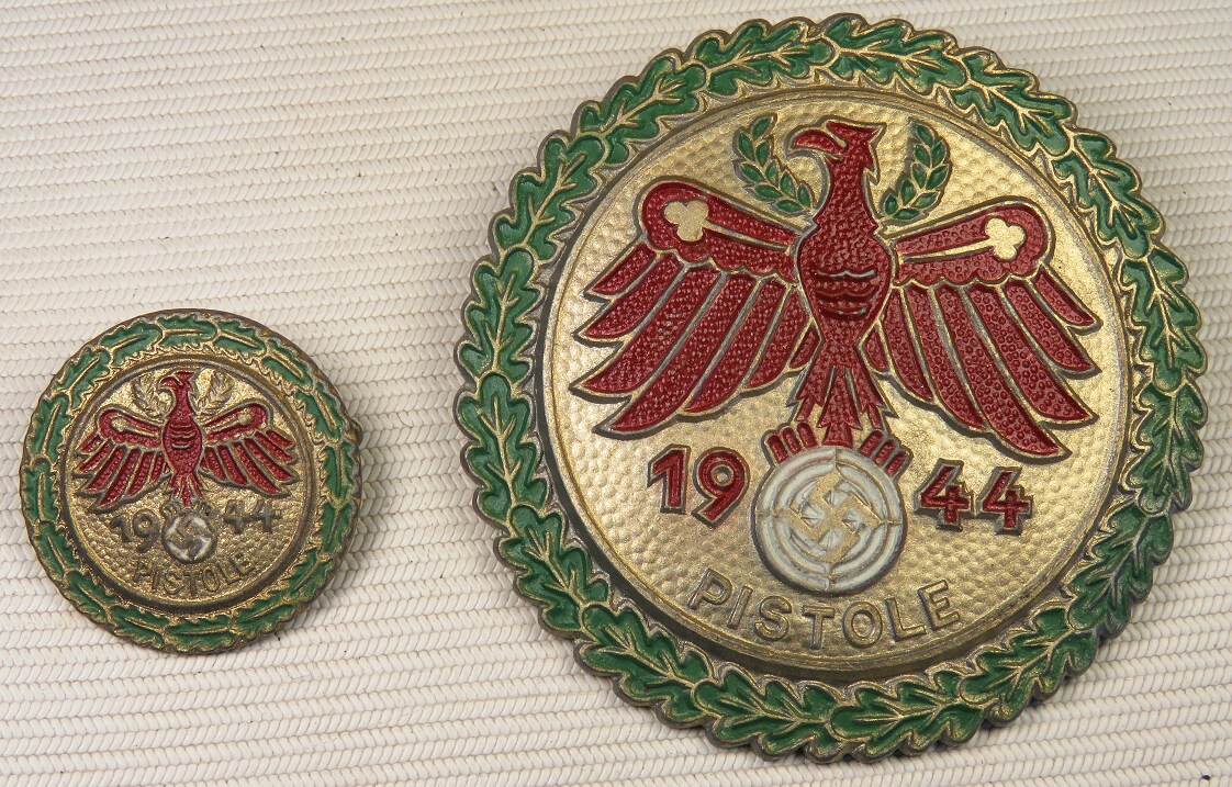 23 mm Tirol Shooting badge in gilded zinc with oakleaves