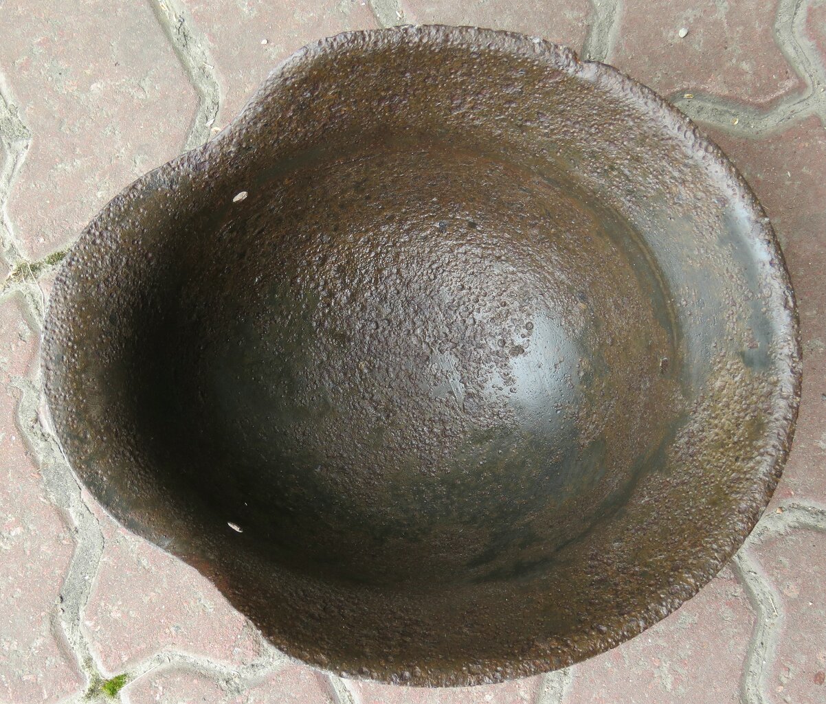 German M 45 Helmet without the ventilation holes. Rare.