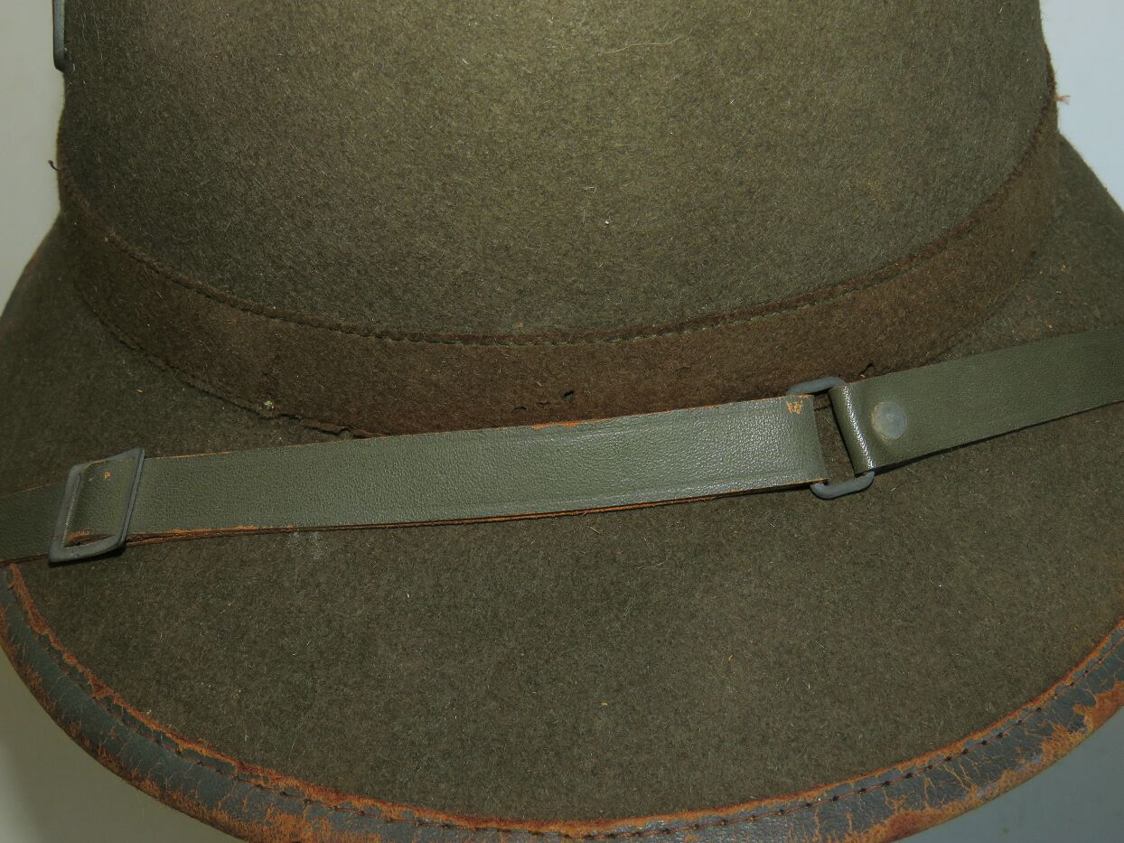 Wehrmacht tropical pith helmet in olive felt with two insignia
