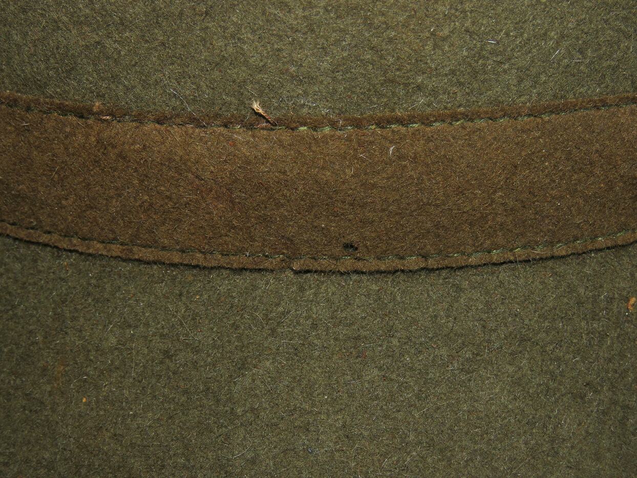 Wehrmacht tropical pith helmet in olive felt with two insignia