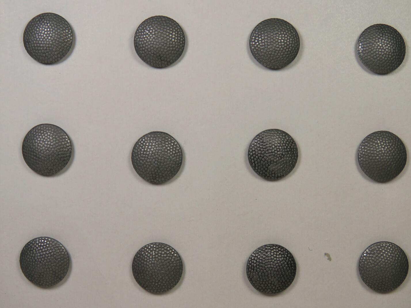Set of 2 buttons for Wehrmacht, SS or Luftwaffe officer's headgear.