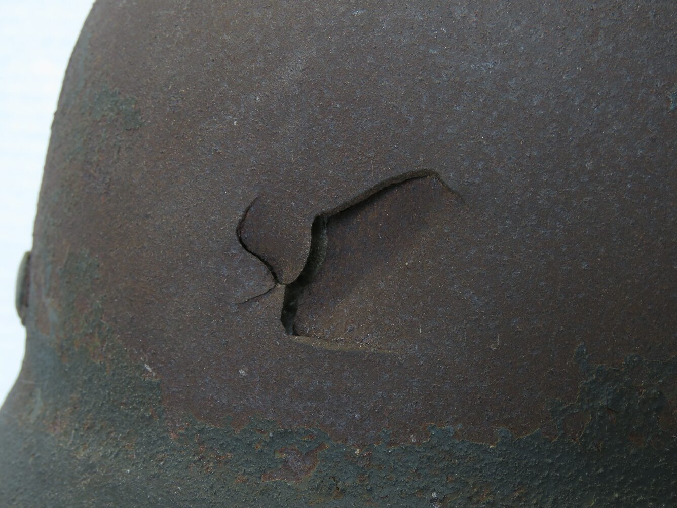 German m35 Wehrmacht Heer steel helmet. Battle damaged!