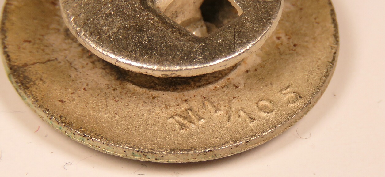 NSDAP party badge M1/105 RZM Hermann Aurich