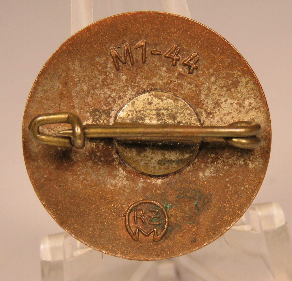 NSDAP party badge M1/44RZM -C.Dinsel-Berlin/Waidmannslust
