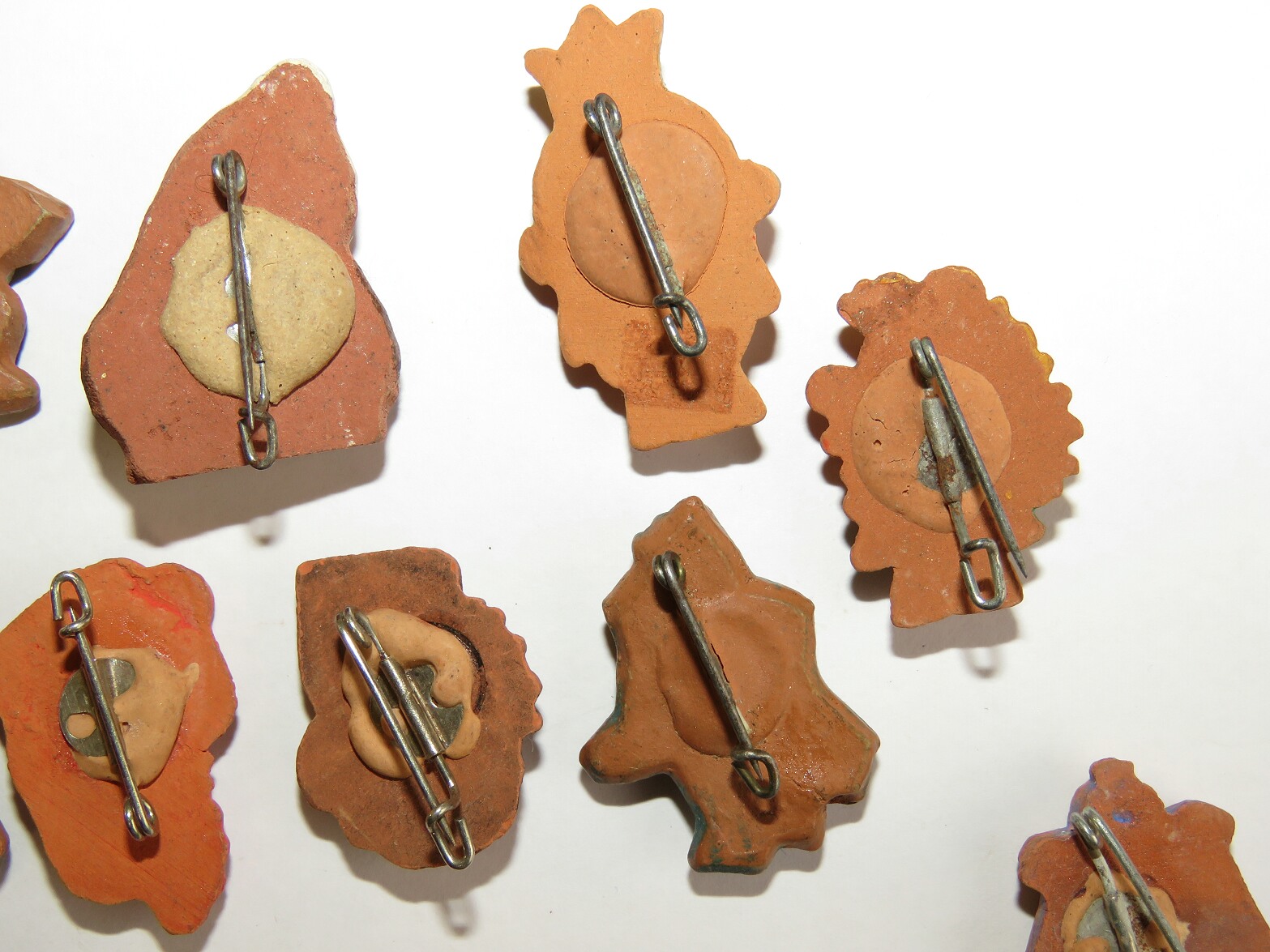 15 clay figurines, badges of the WHW series. 3rd Reich
