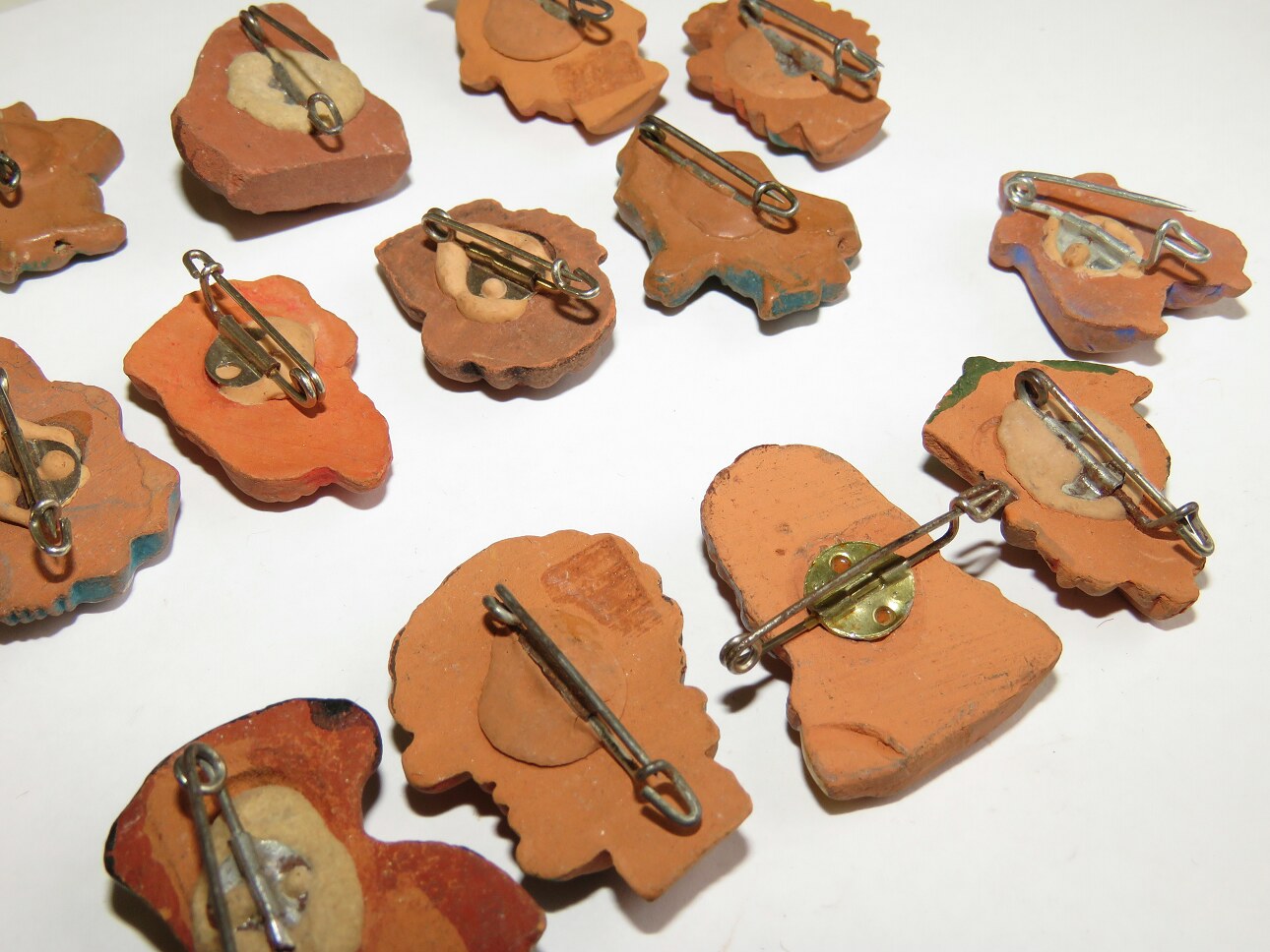 15 clay figurines, badges of the WHW series. 3rd Reich