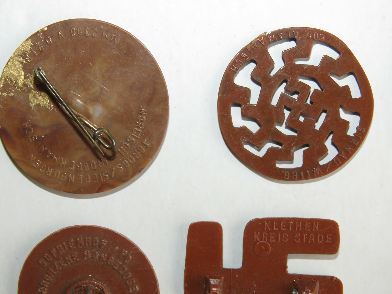 WHW Schmuck alter Kulturvölker mit Hakenkreuz-Symbol