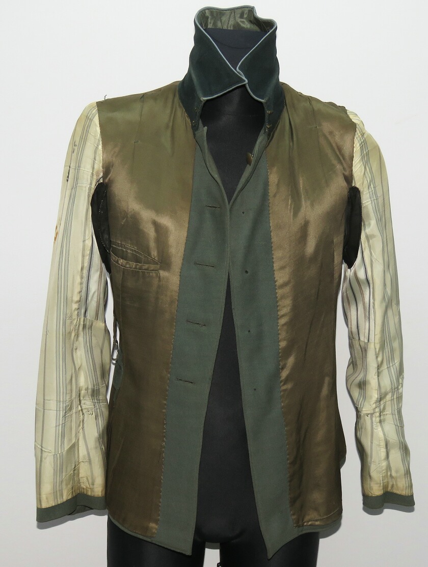 German Wehrmacht officer's tunic with a dark green collar and blue piping