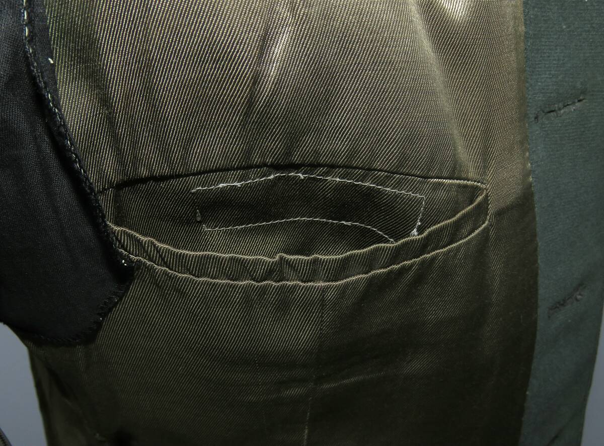 German Wehrmacht officer's tunic with a dark green collar and blue piping