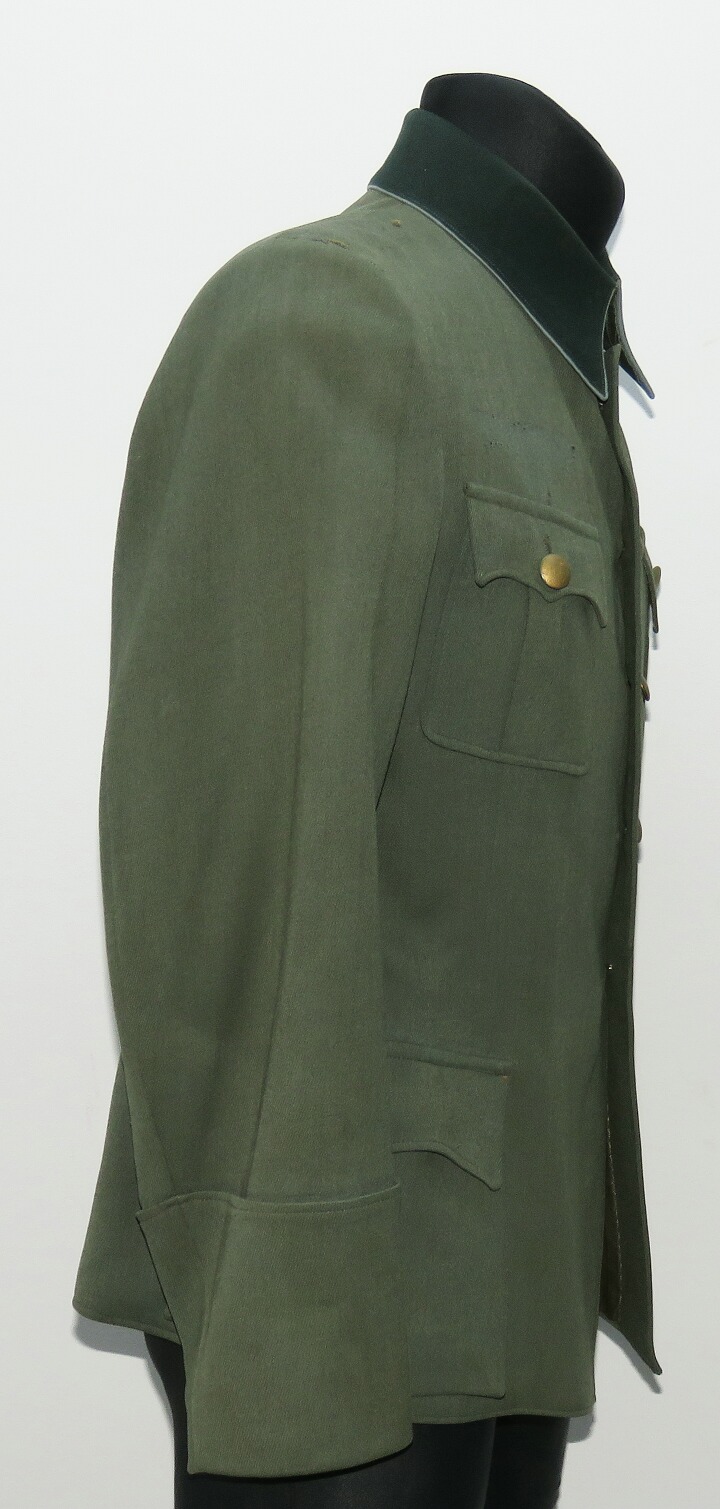 German Wehrmacht officer's tunic with a dark green collar and blue piping