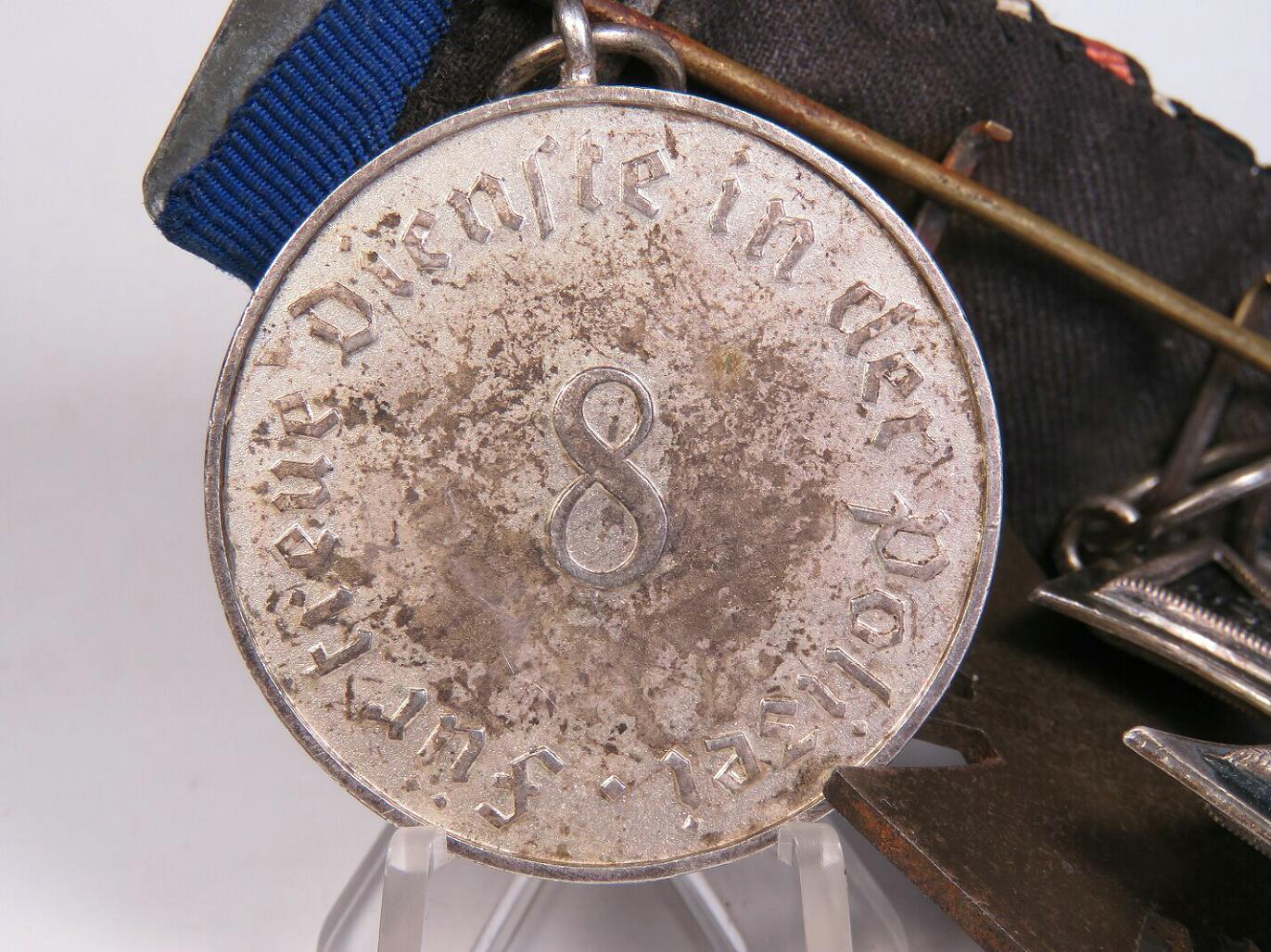 A medal bar of 3 awards for a WWI veteran, a police officer in the 3rd ...