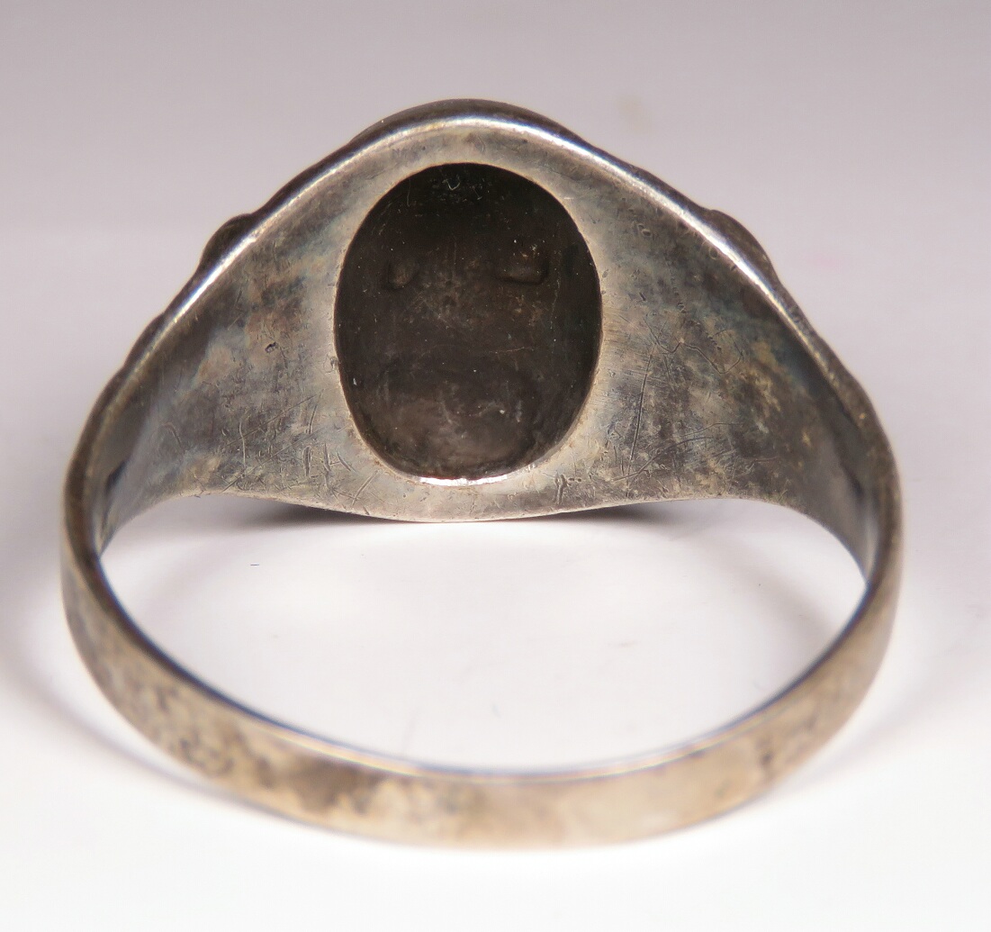 WW2 German Traditional ring with a skull and crossbones, framed in oak ...