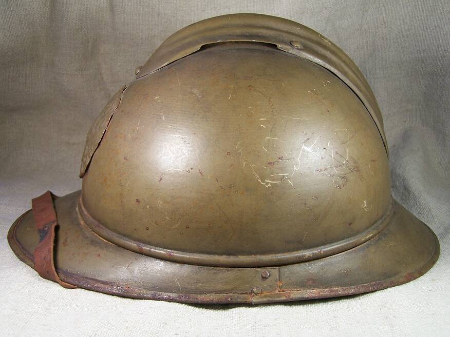 M 15 Russian Czarist Adrian helmet.- Headgear